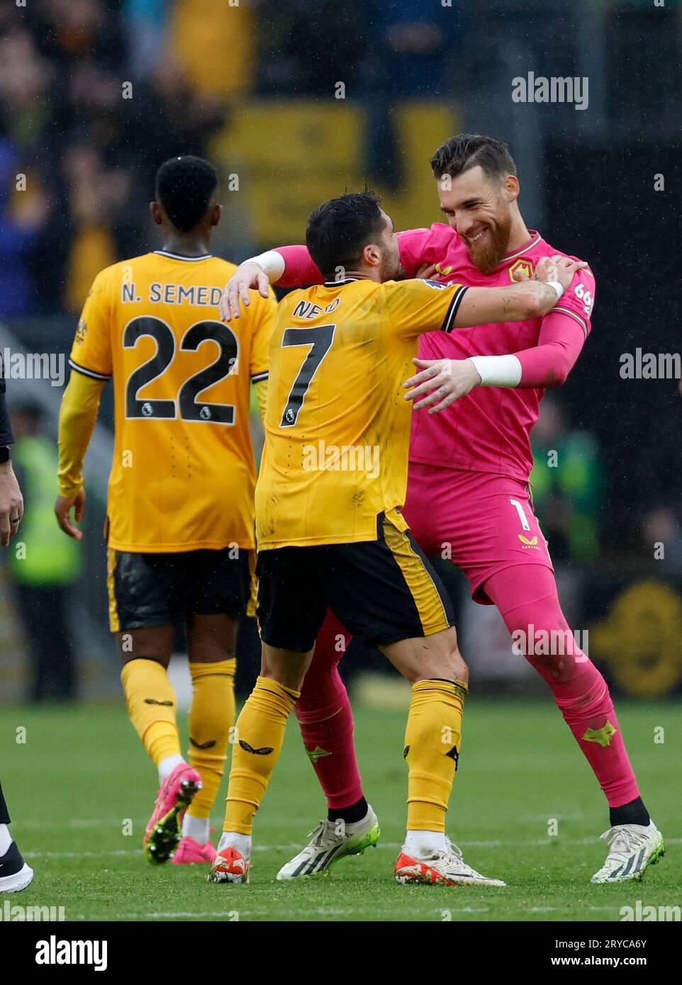 Wolverhampton Wanderers' Pedro Neto (left) and goalkeeper Jose Sa ...