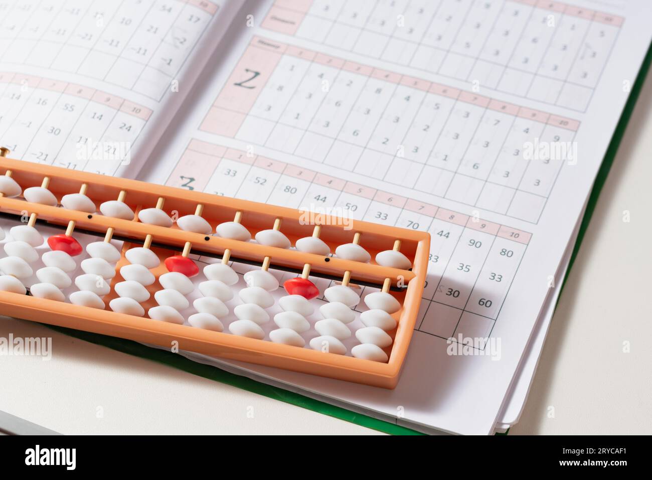 Japanese traditional abacus soroban on white background. Child using ...
