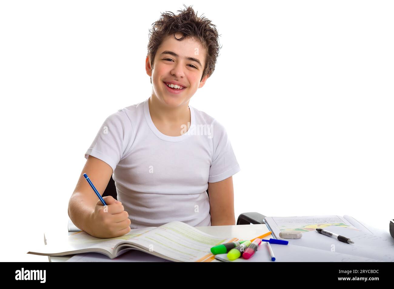 Boy writing at table happy hi-res stock photography and images - Alamy