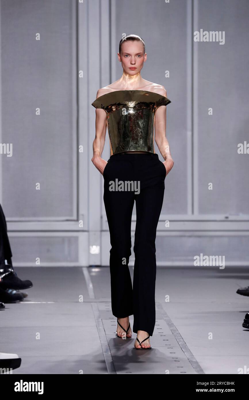 A model walks on the runway at the Coperni fashion show during the ...