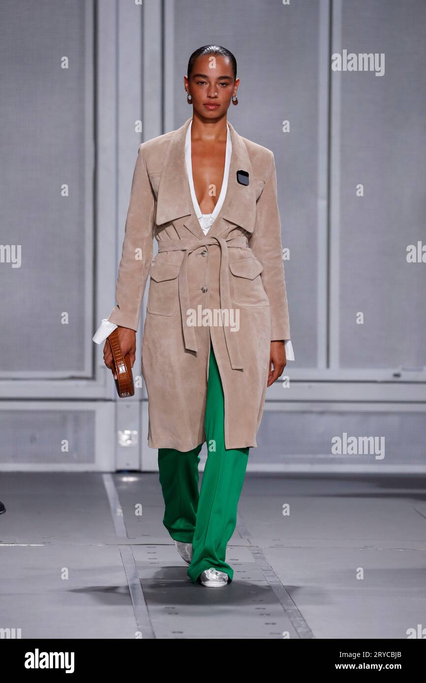 Model Arnelle Slot walks on the runway at the Coperni fashion show ...