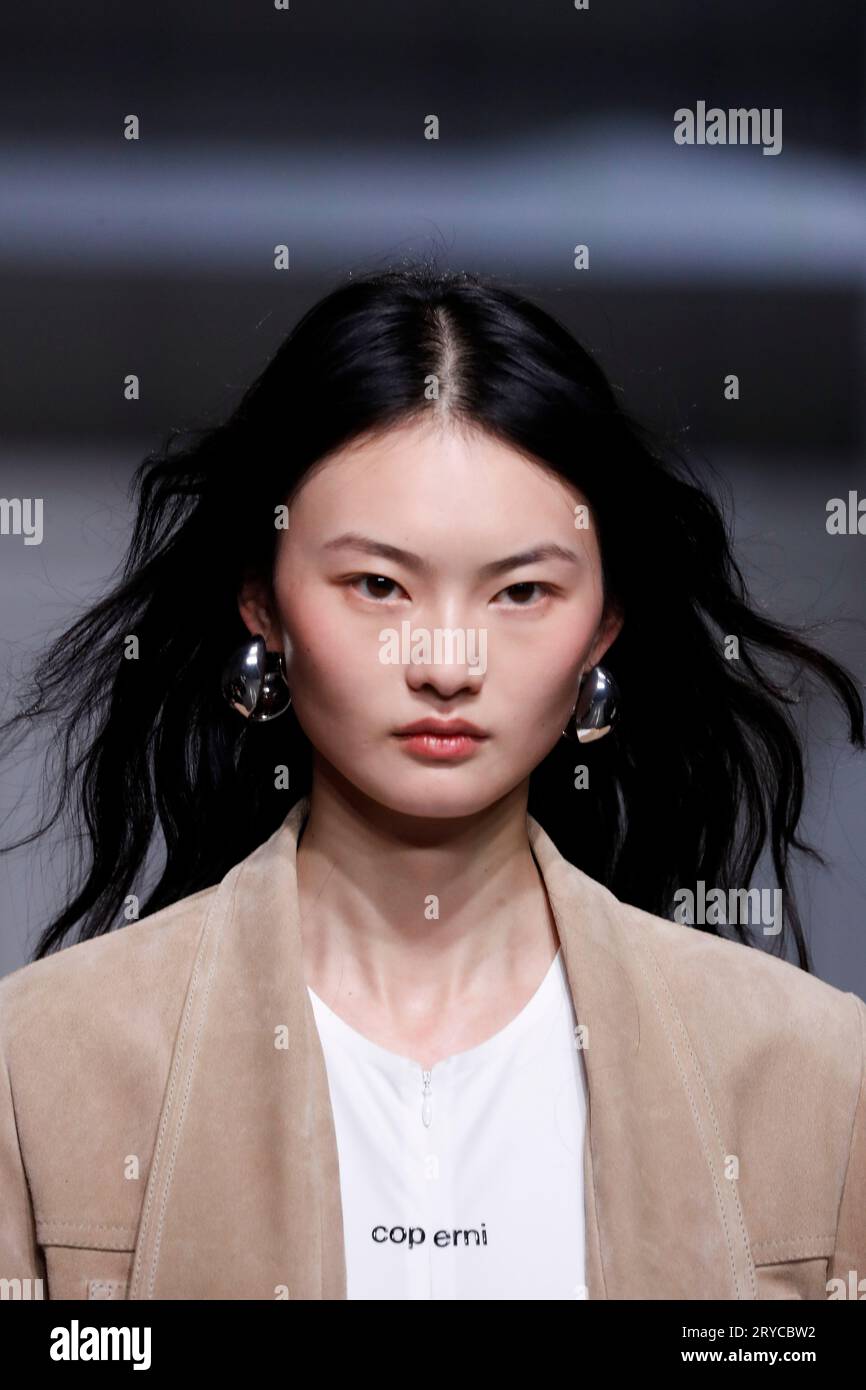 Model He Cong walks on the runway at the Coperni fashion show during ...
