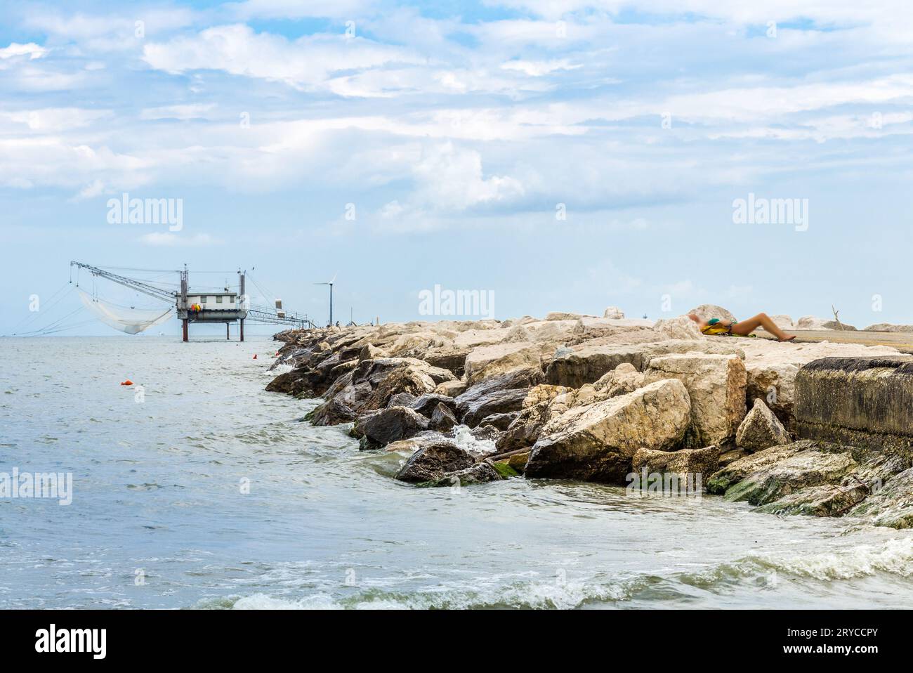 Woman fishing on pier hi-res stock photography and images - Alamy