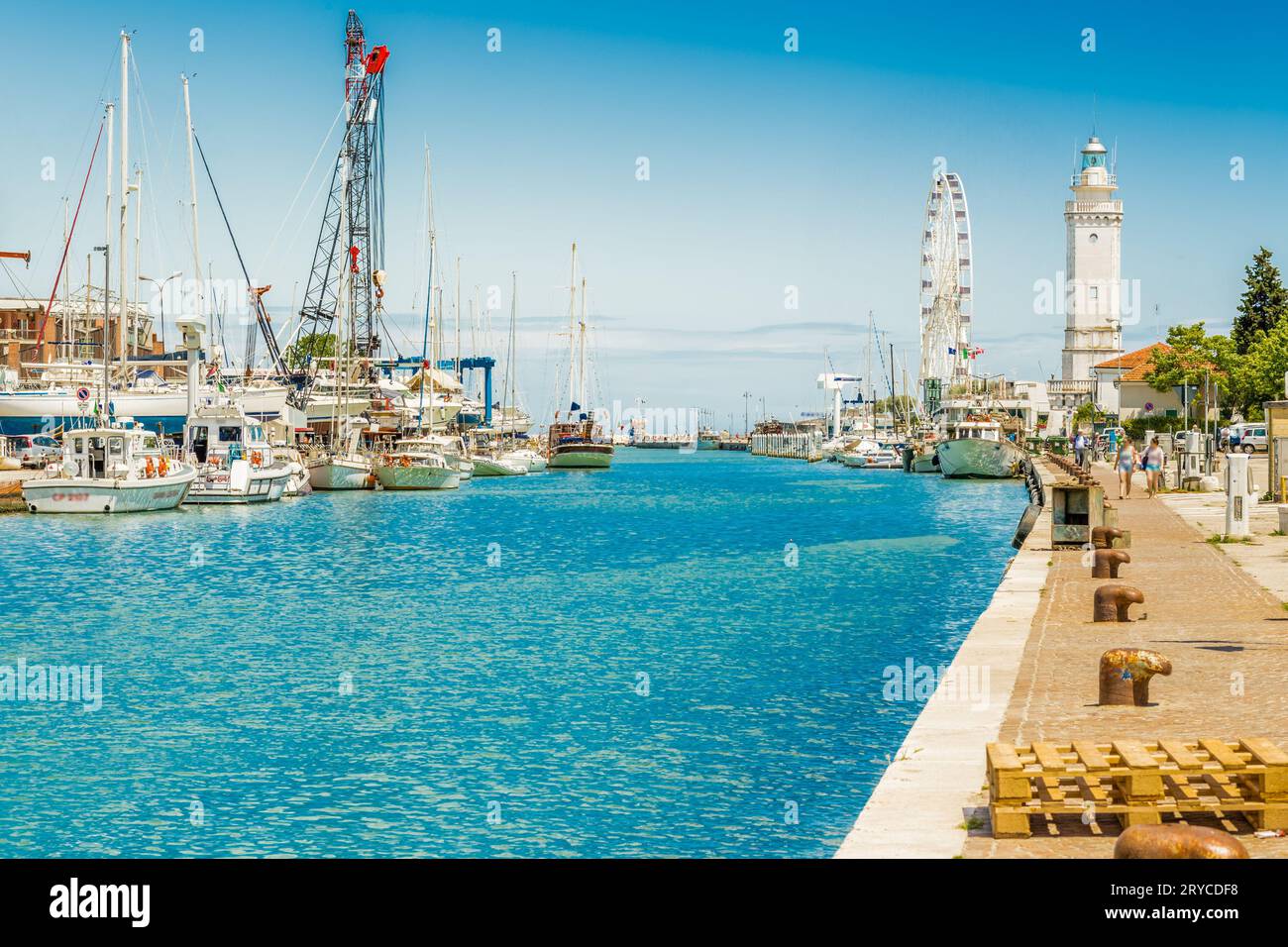 Boats moored in harbor channel Stock Photo - Alamy
