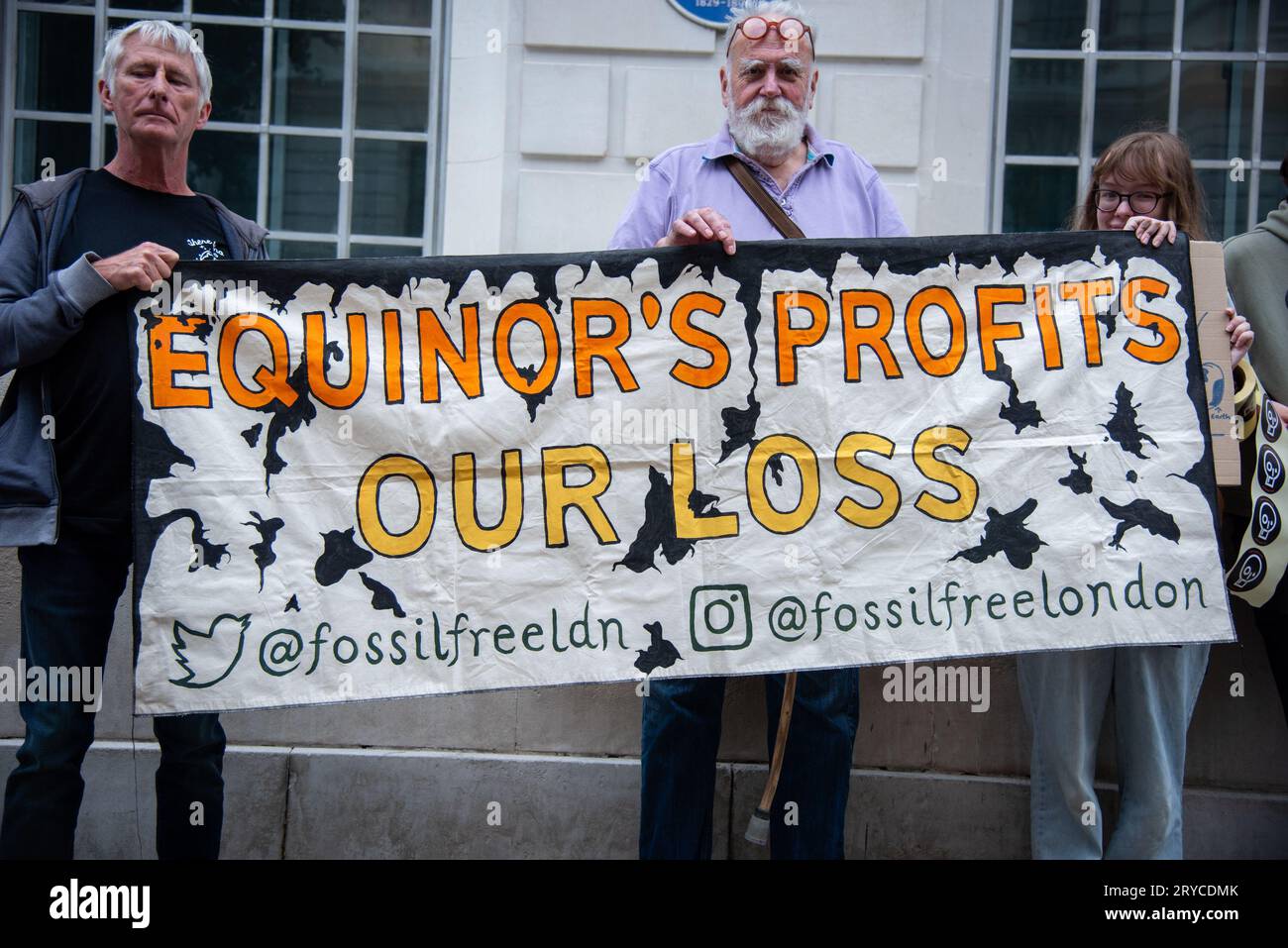 London, UK. 30th Sep, 2023. Protestors hold a large banner during the ...