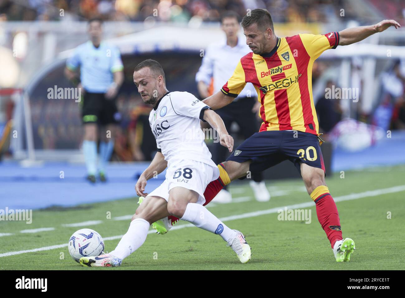Lecce, Italy. 30th Sep, 2023. Ylber Ramadani (Lecce) pushes Stanislav ...
