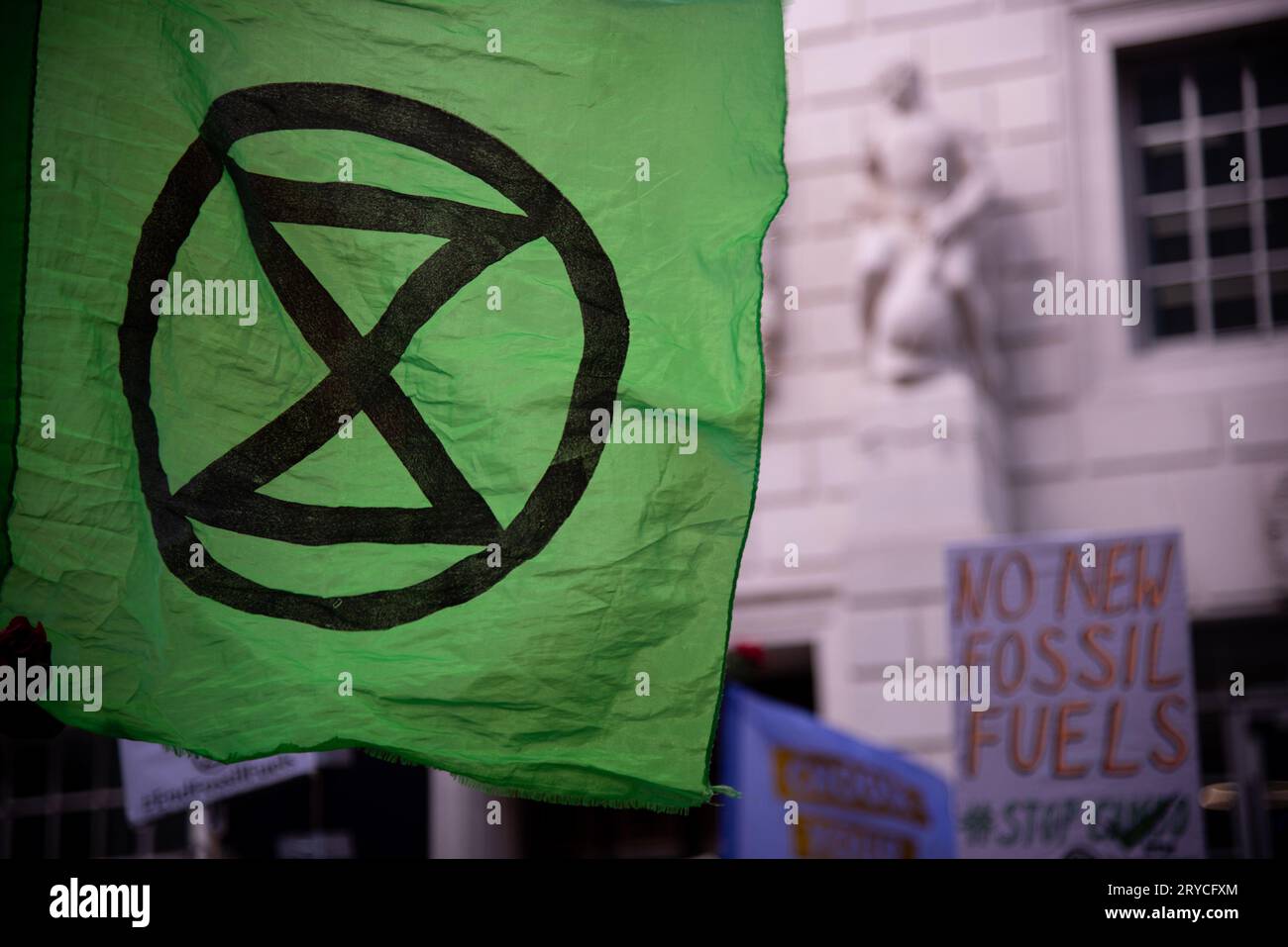 London, UK. 30th Sep, 2023. The Extinction Rebellion flag waves during ...