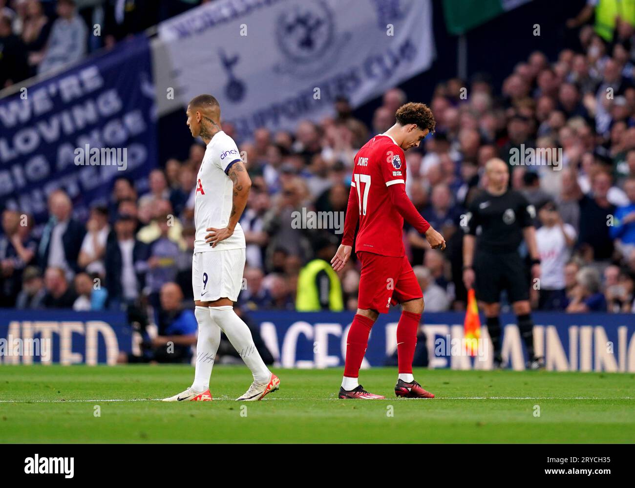 Liverpool's Curtis Jones leaves the pitch after being shown a red card ...