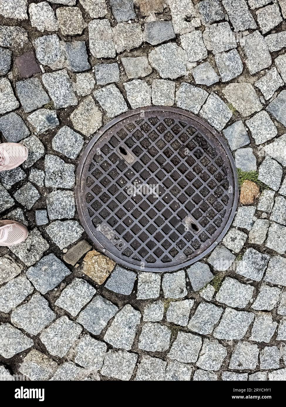 Manhole cover of the gas pipeline system. A massive metal hatch for ...