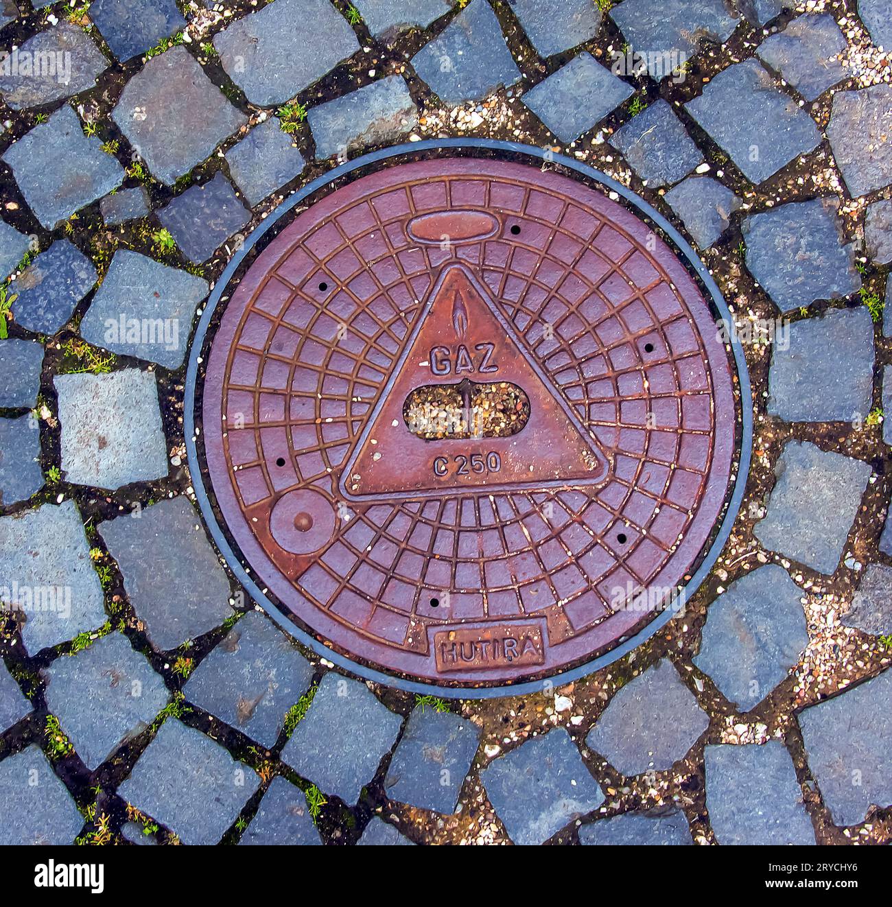 Manhole cover of the gas pipeline system. A massive metal hatch for ...