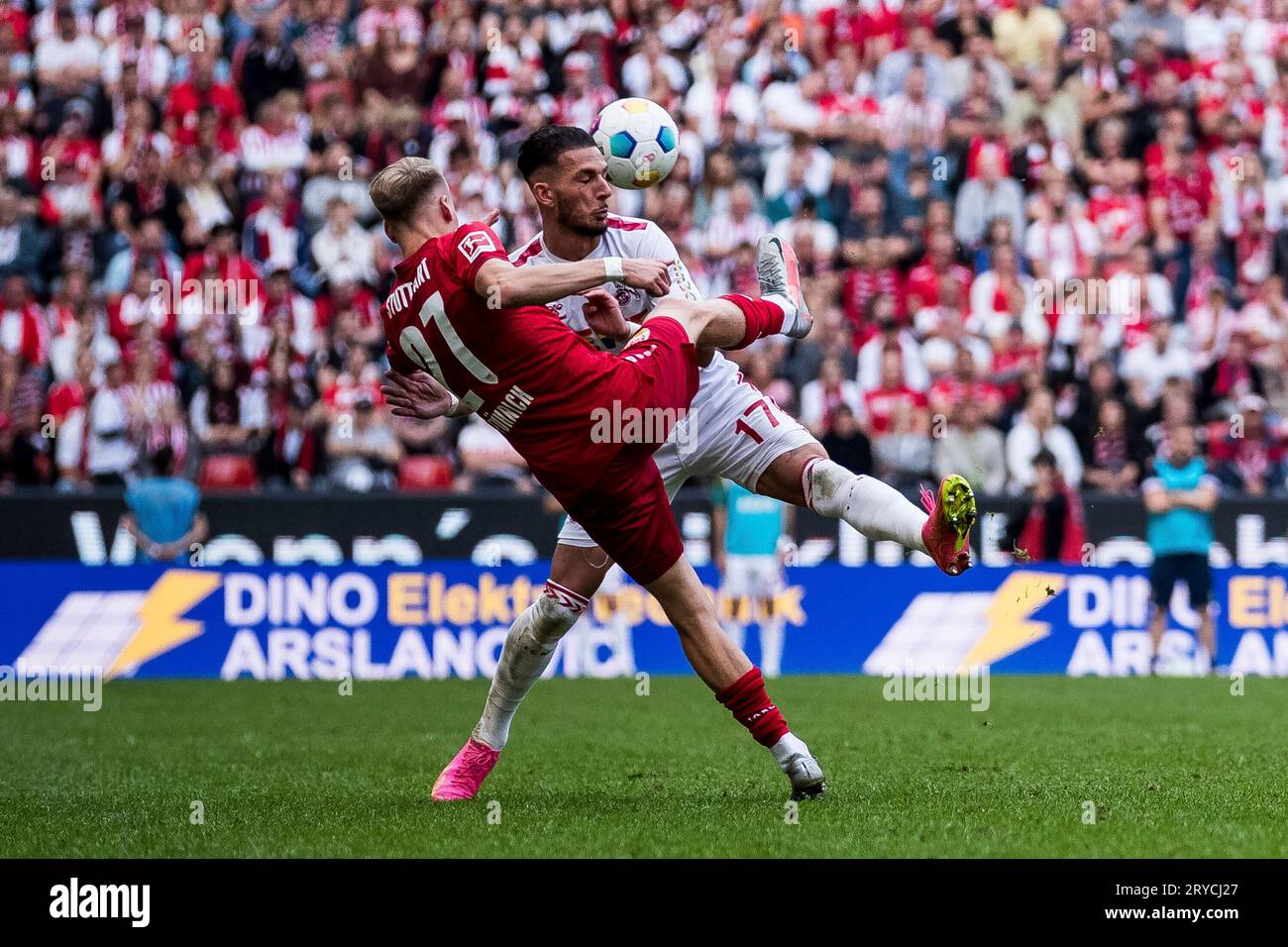 Koeln, Deutschland. 30th Sep, 2023. Zweikampf Chris Fuehrich (VfB Stuttgart, #27), Leart ...