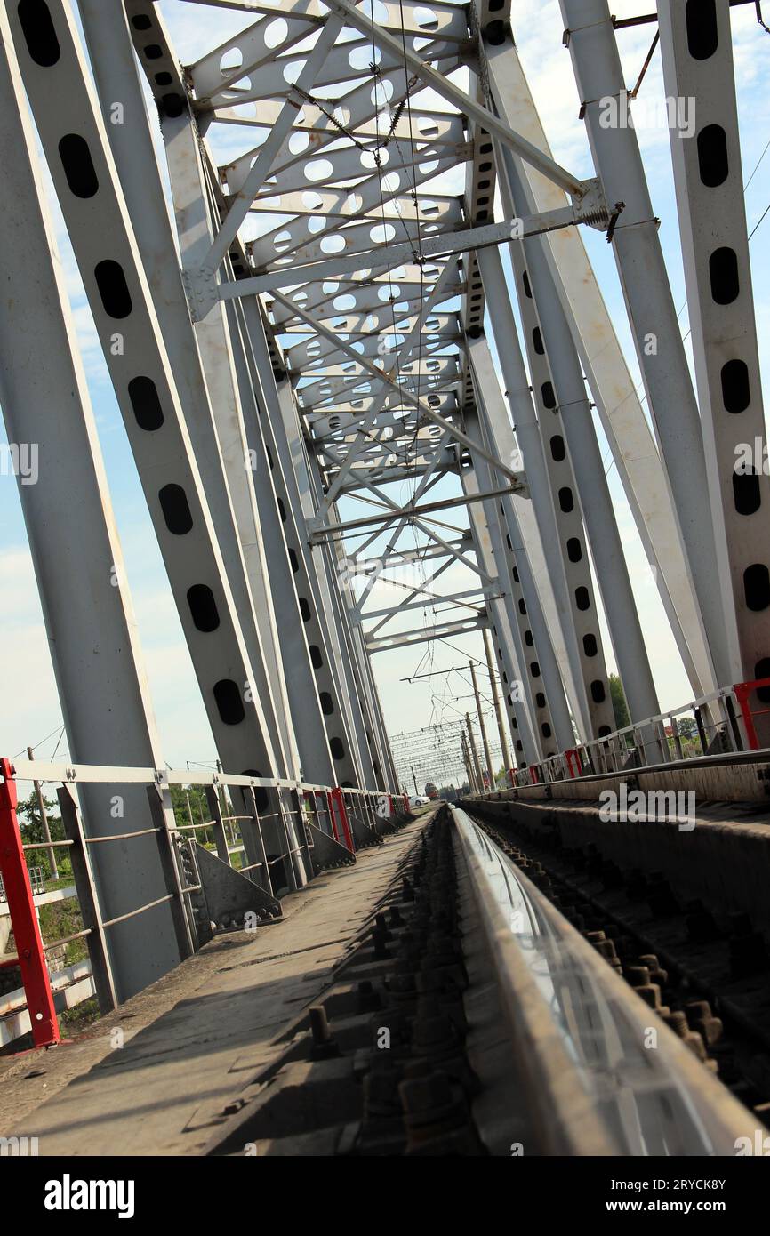 Railway metal bridge perspective view Stock Photo - Alamy