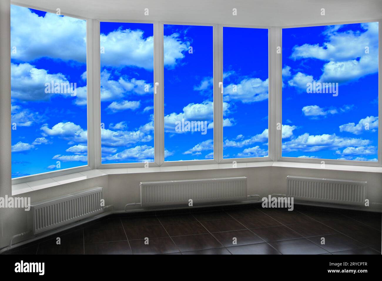 Window of room overlooking blue sky with white clouds. Modern window ...