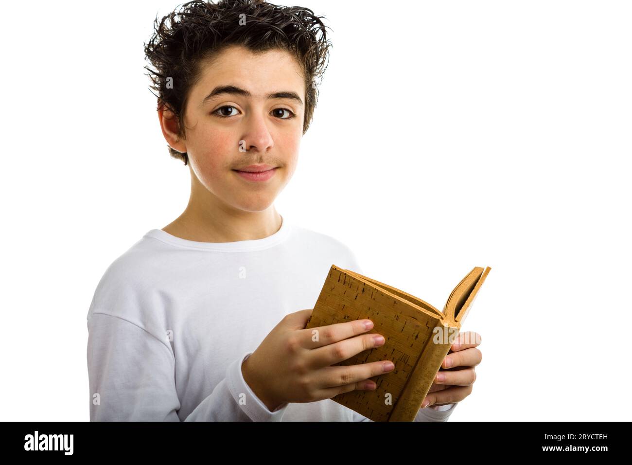 Cute boy reads brown cork blank book smiling Stock Photo - Alamy