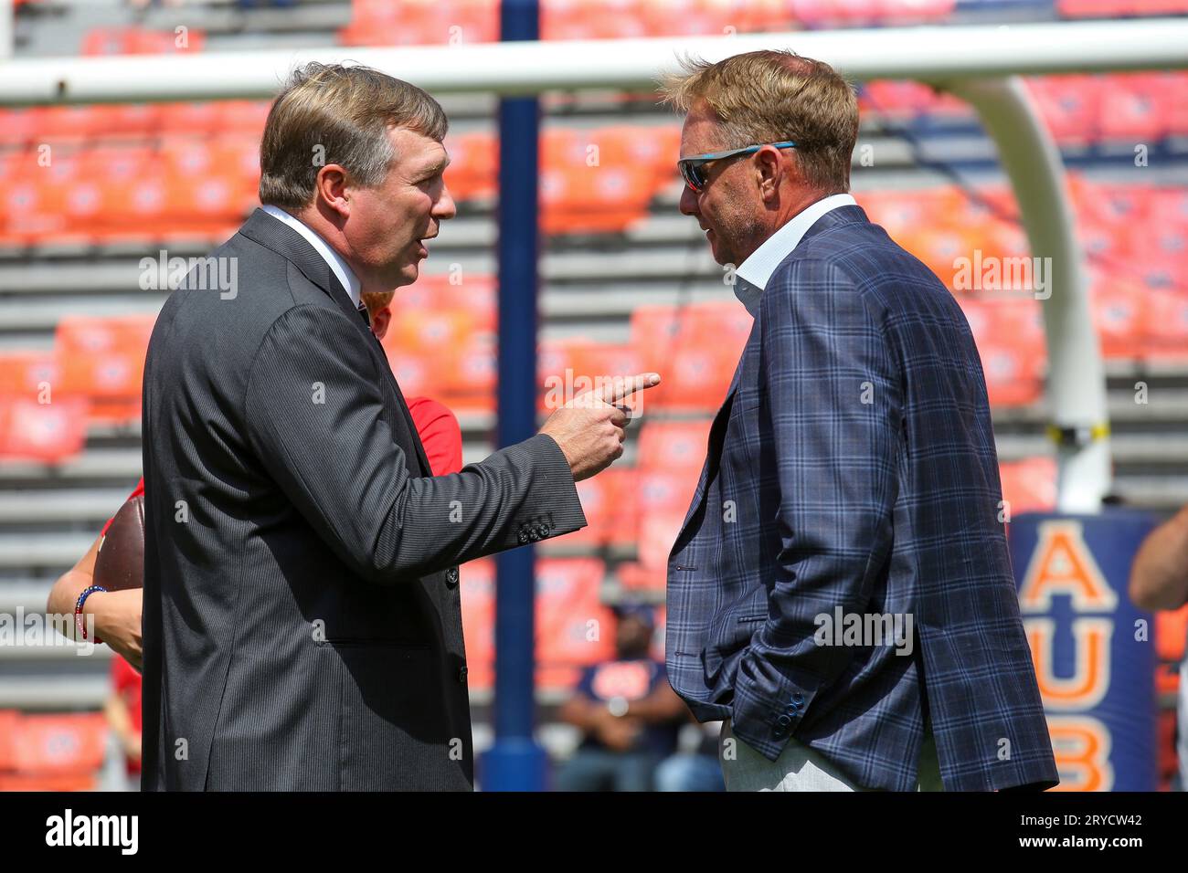 Georgia head coach Kirby Smart, left, talks with Auburn football head ...