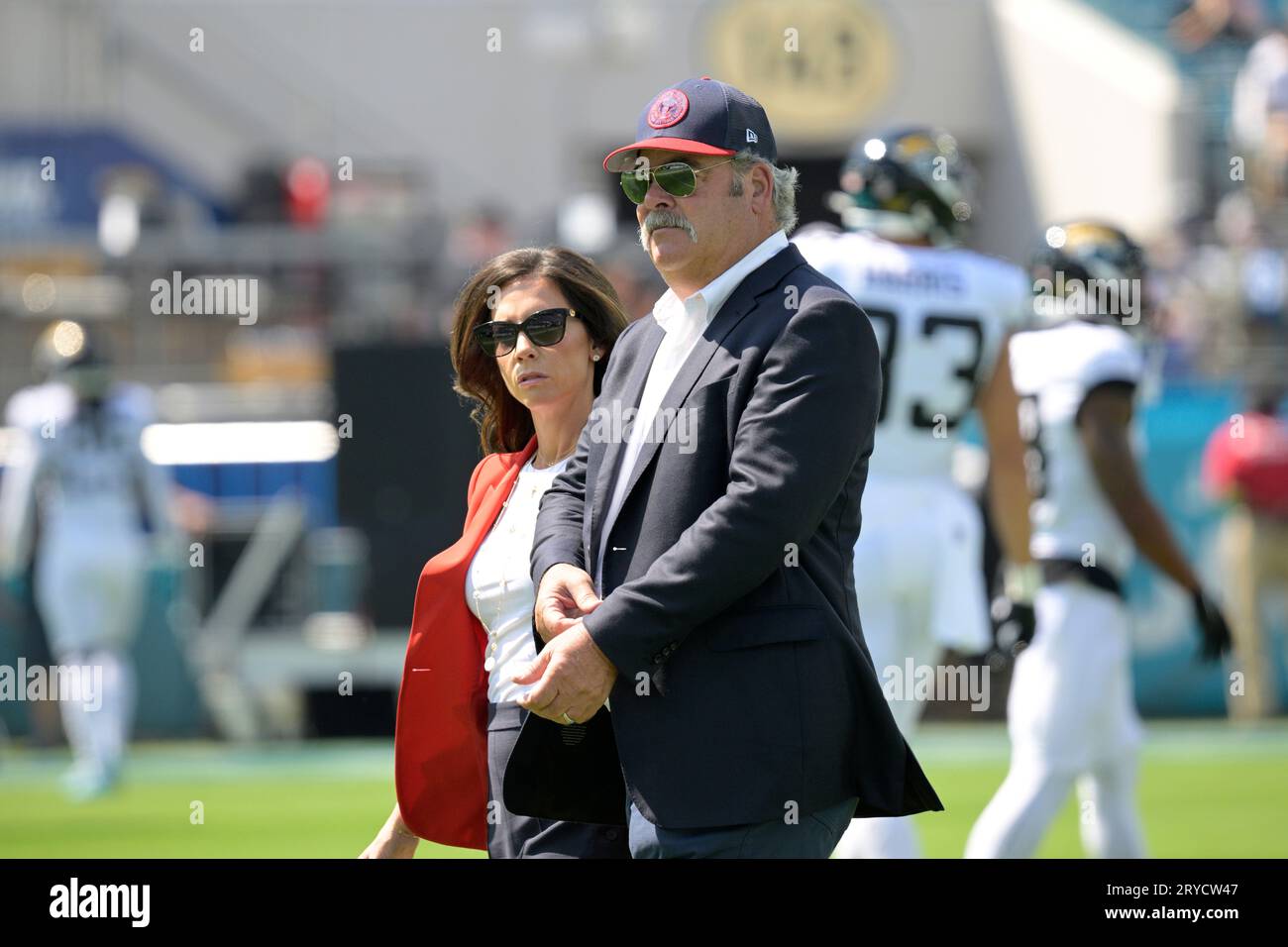 Houston Texans CEO Cal McNair, front, walks with his wife Hannah McNair ...