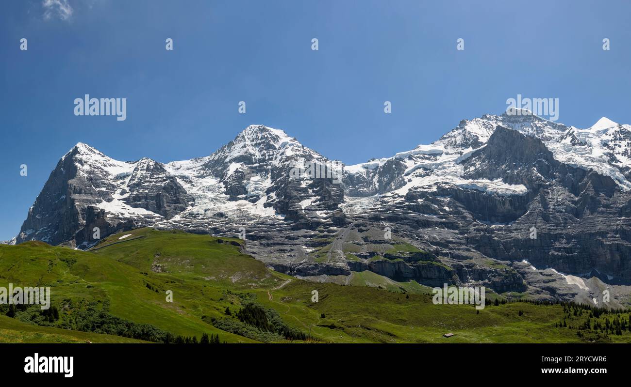the mountains eiger monch and jungfrau above wengen village in the ...