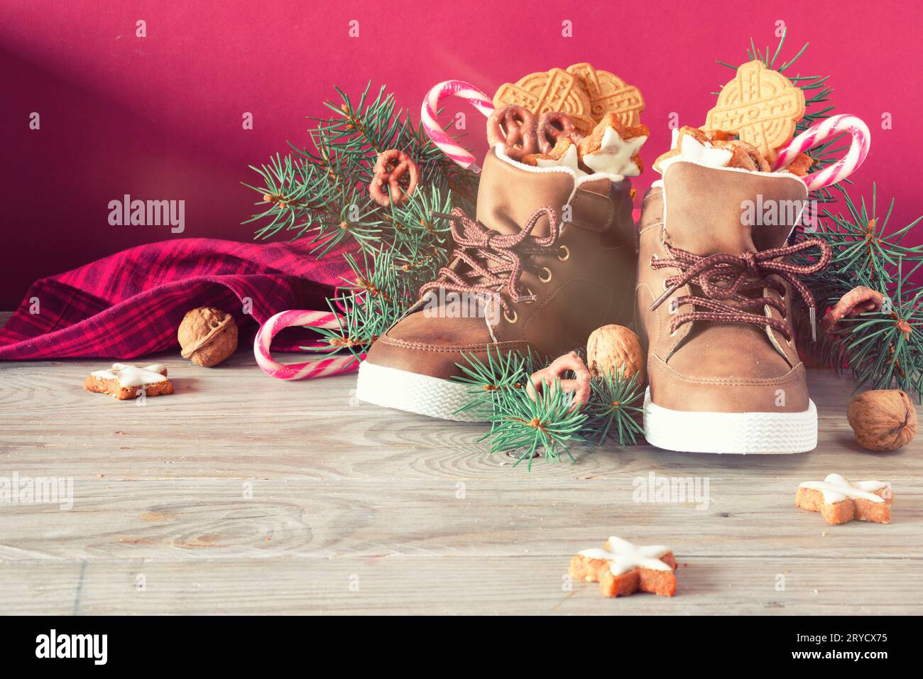 Saint Nicholas Day or Nikolaus. Children shoes filled with traditional ...