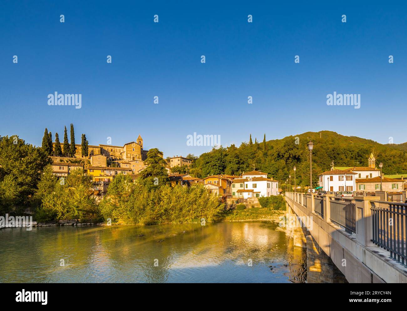 Medieval village on river Stock Photo - Alamy
