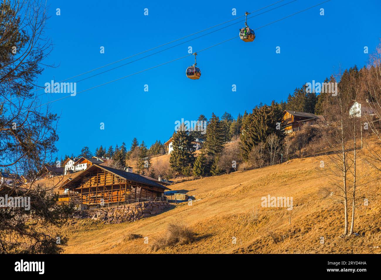 Cable car in alpine landscape Stock Photo - Alamy