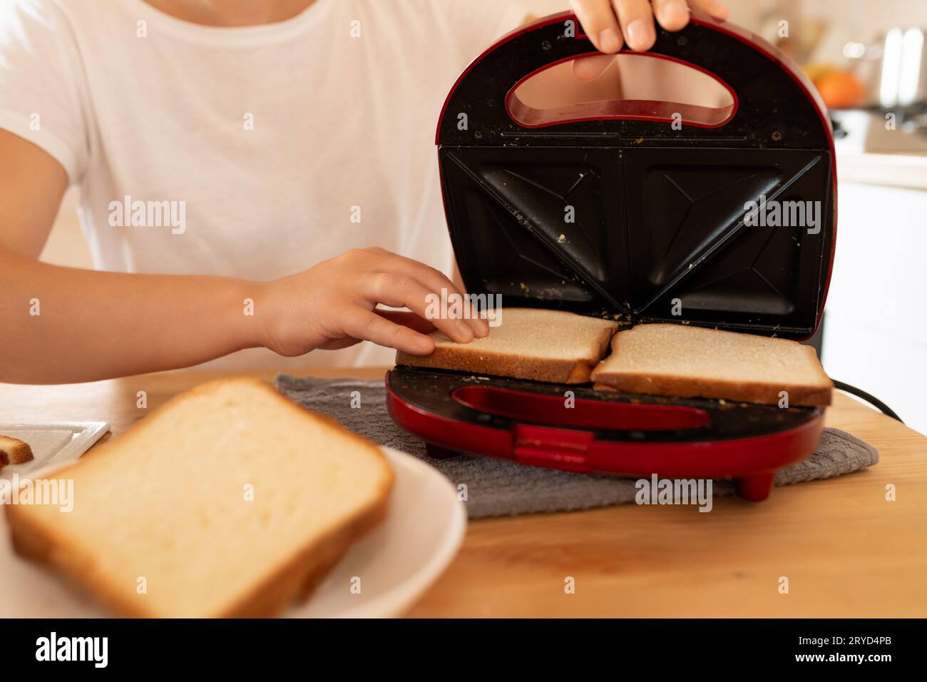 Toaster toast hands hi-res stock photography and images - Alamy