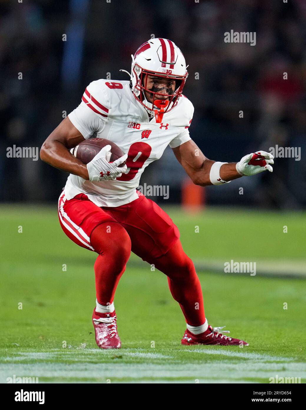 Wisconsin wide receiver Bryson Green (9) runs after a catch against ...