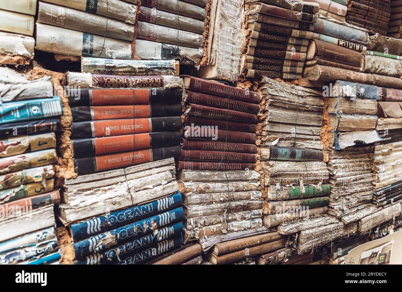 Pile of books volumes inside the bookstore Libreria Acqua Alta in ...