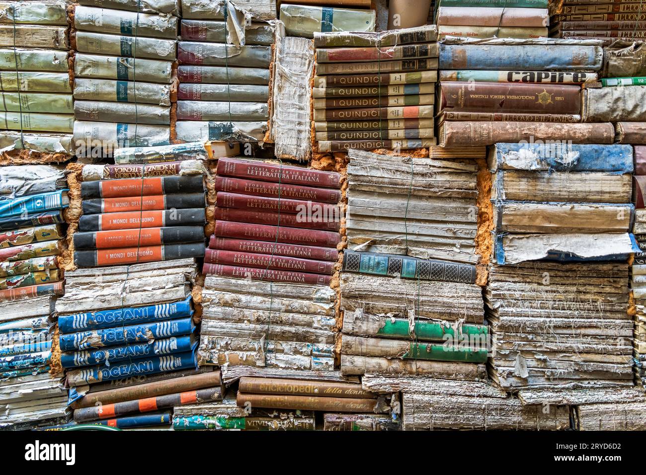 Pile of books volumes inside the bookstore Libreria Acqua Alta in ...