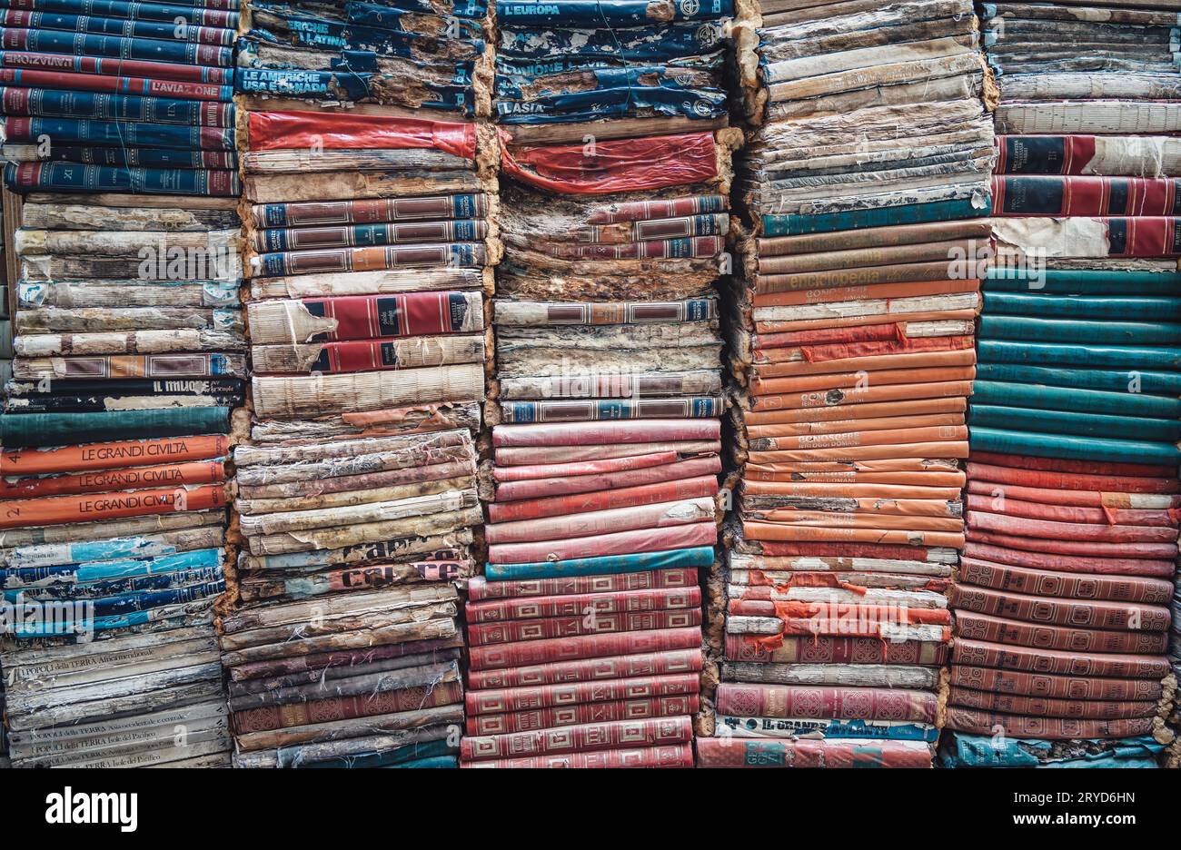 Pile of books volumes inside the bookstore Libreria Acqua Alta in ...