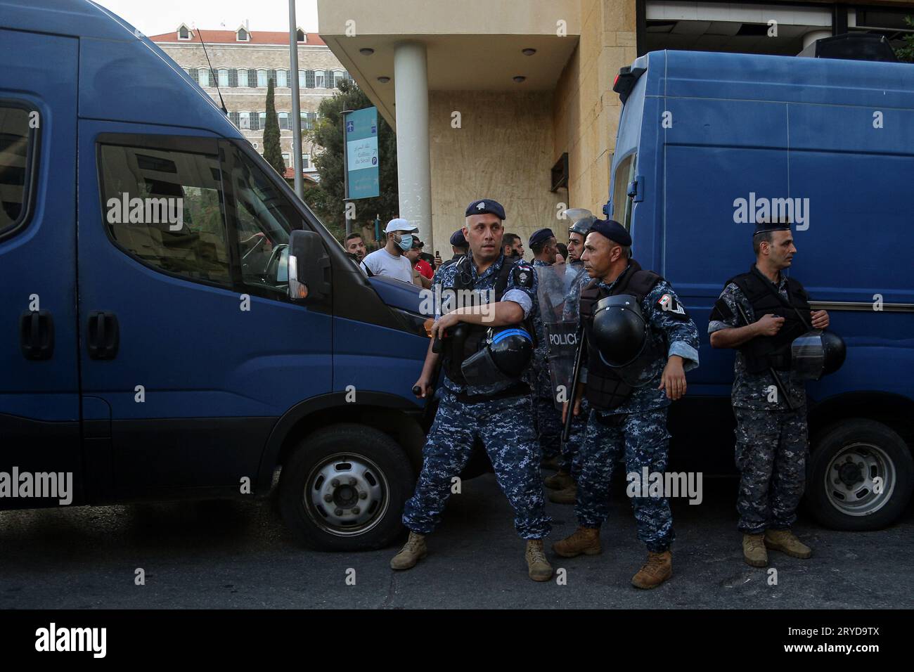 Beirut, Lebanon. 30th Sep, 2023. Riot police secure a van where ...