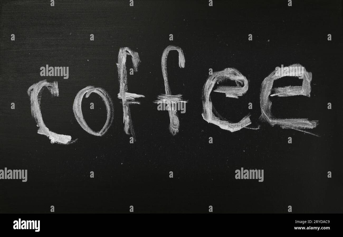 White chalk COFFEE word over black chalkboard Stock Photo - Alamy