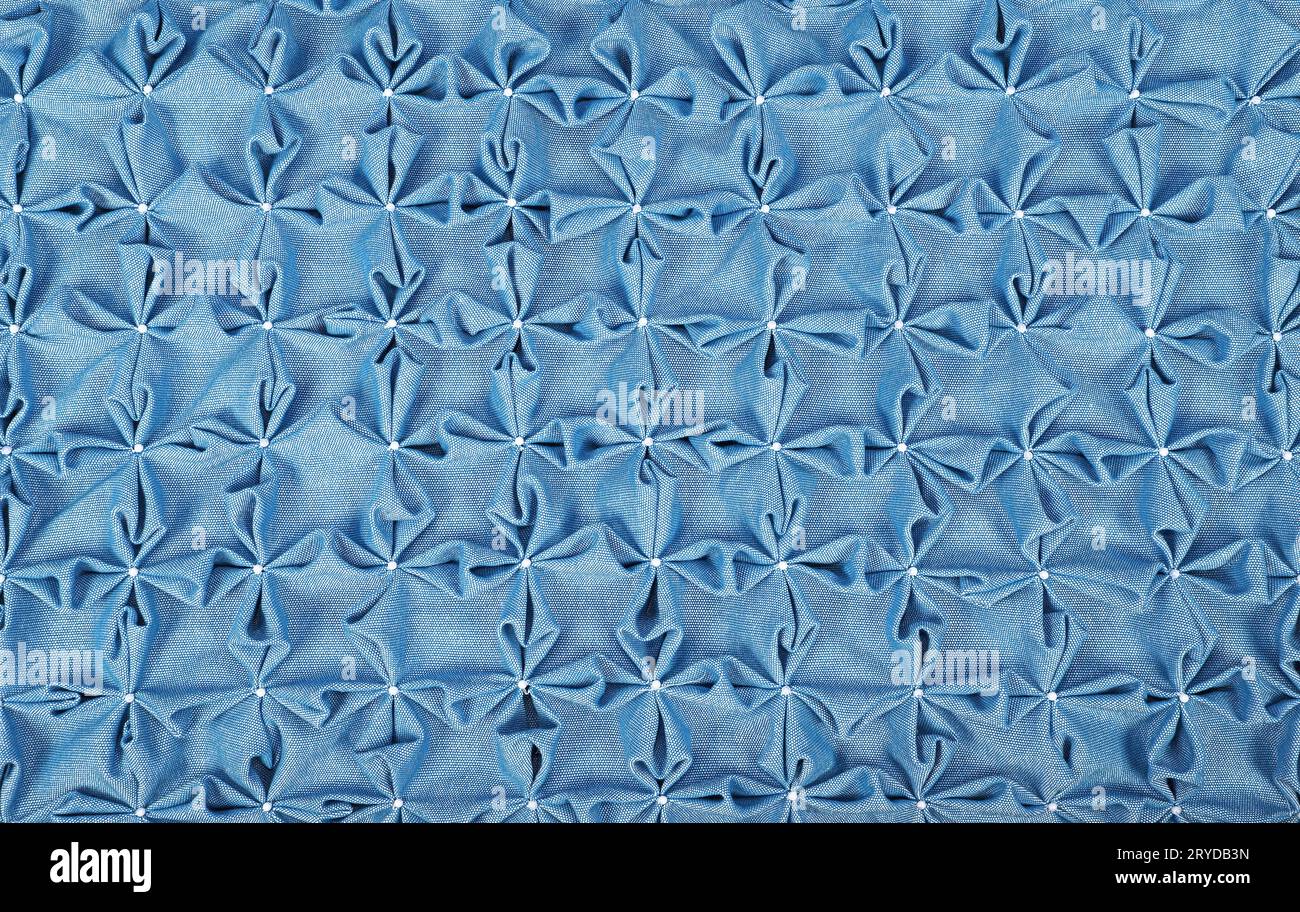 Close up background of blue textile puffs Stock Photo - Alamy