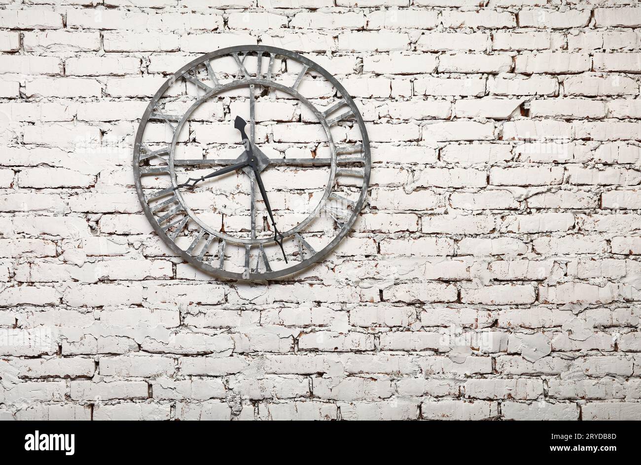 Brick wall with clock hi-res stock photography and images - Alamy