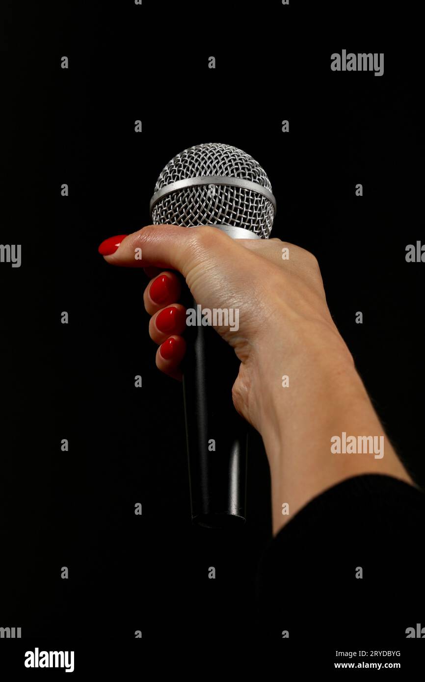 Woman with microphone interview hi-res stock photography and images - Alamy