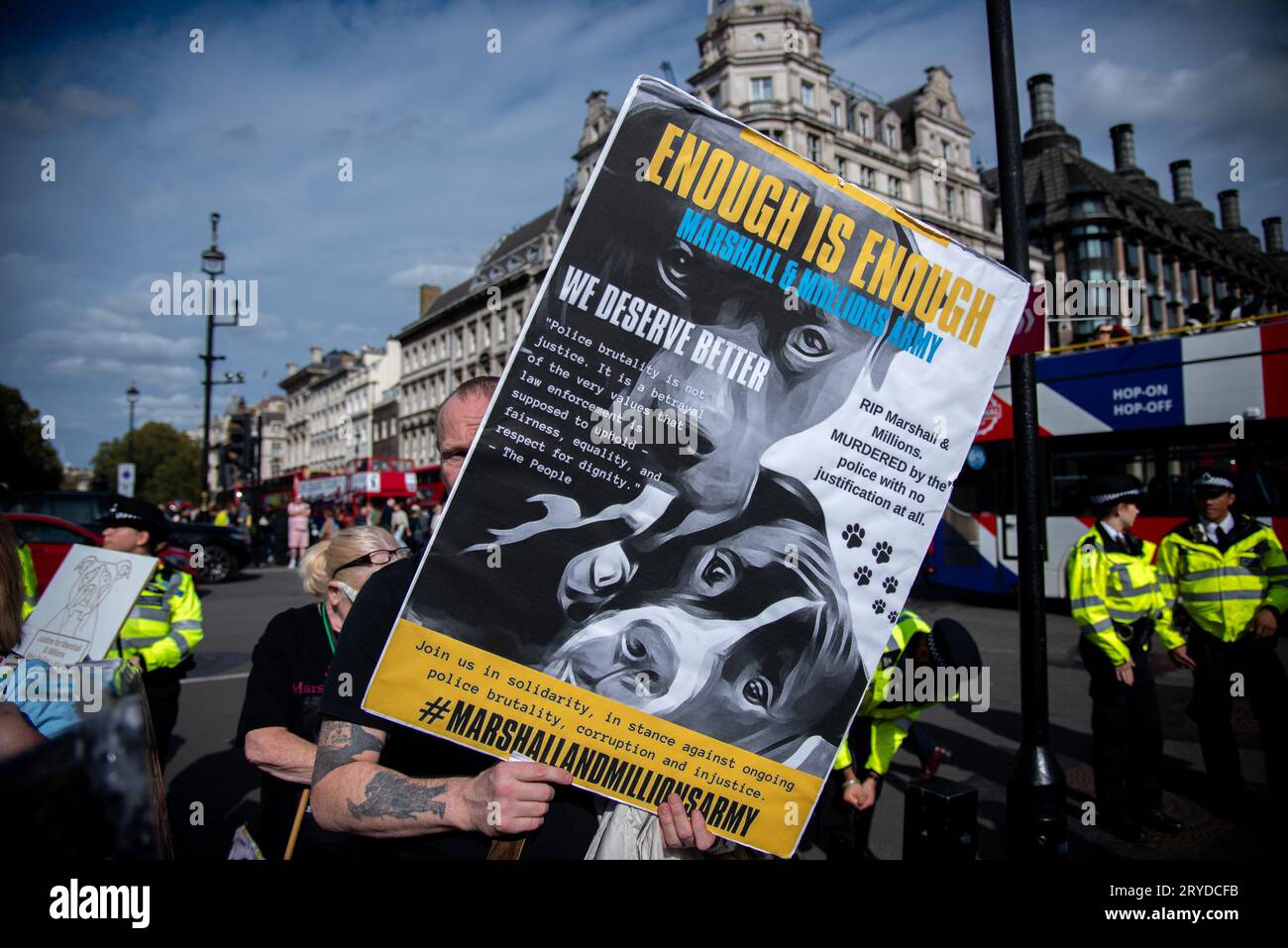 London, UK. 30th Sep, 2023. A protestor marches with a placard during ...