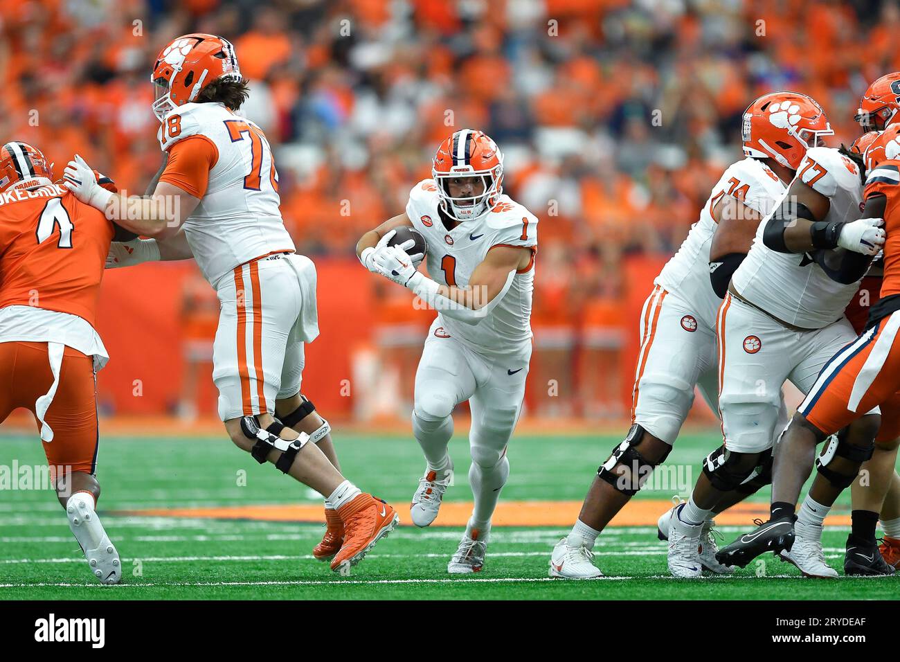 Clemson running back Will Shipley (1) carries the ball between the ...