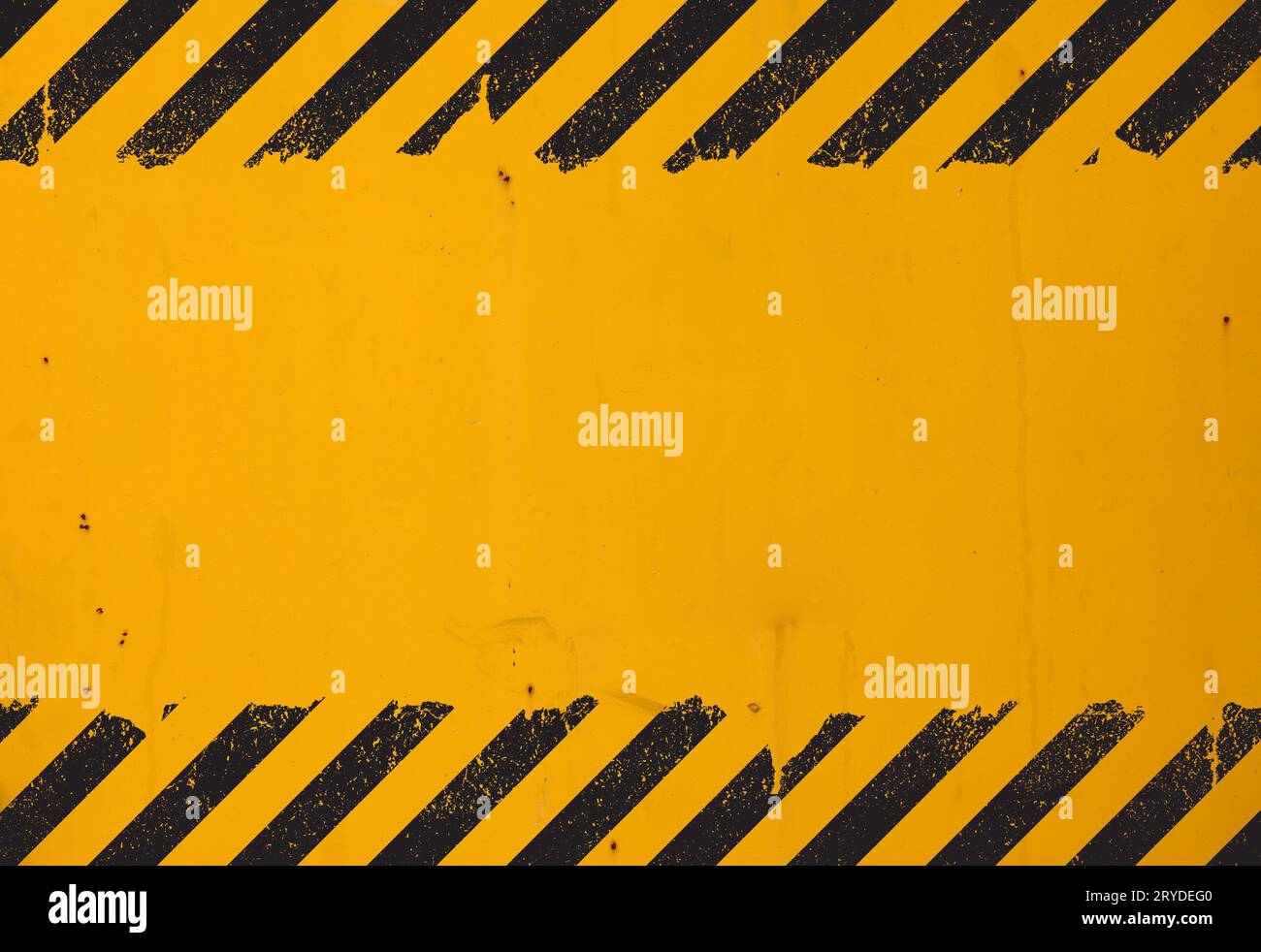 Yellow background with black grunge hazard sign Stock Photo - Alamy