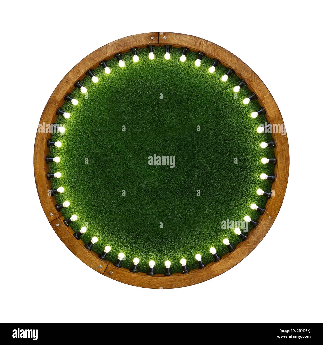 Wooden ring light frame with green grass backdrop Stock Photo - Alamy