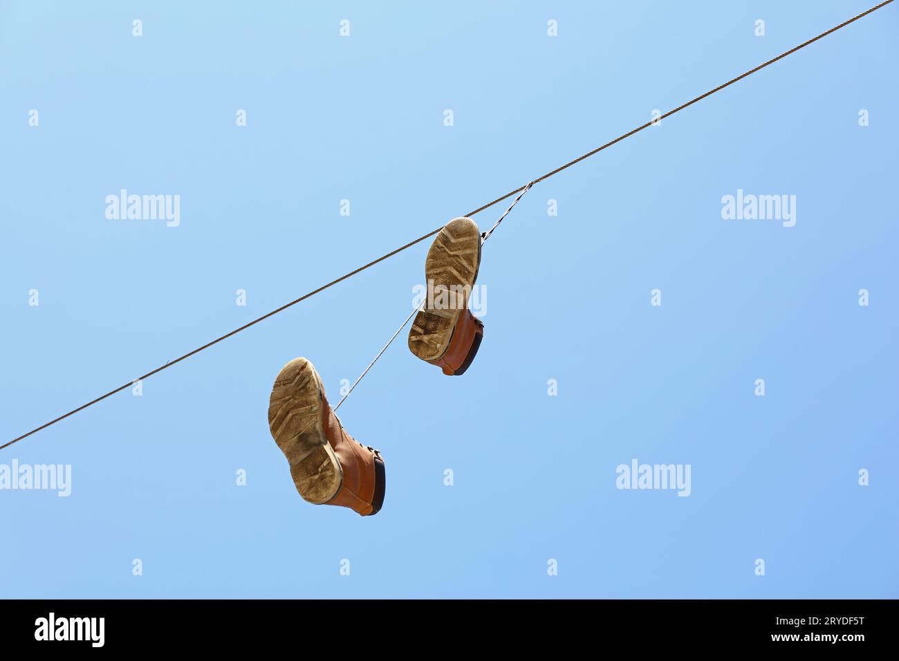 Hanging boots hi-res stock photography and images - Alamy