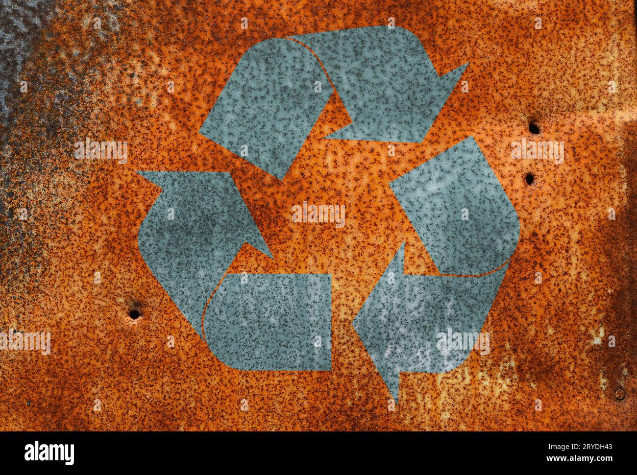 Rust stained corroded metal surfacewith recycling logo sign Stock Photo ...