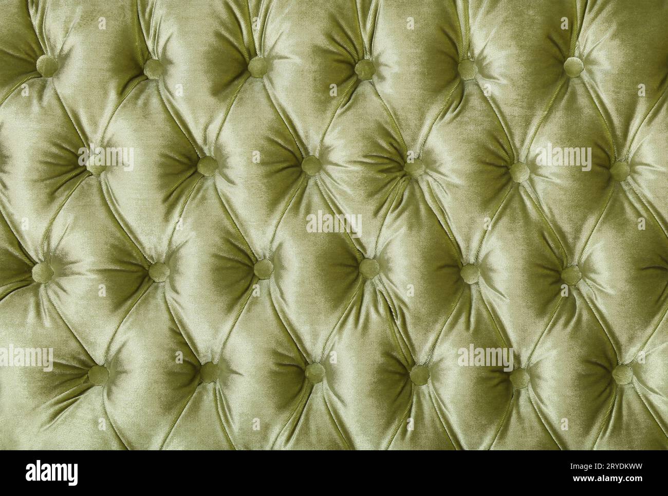 Green capitone tufted fabric upholstery texture Stock Photo - Alamy