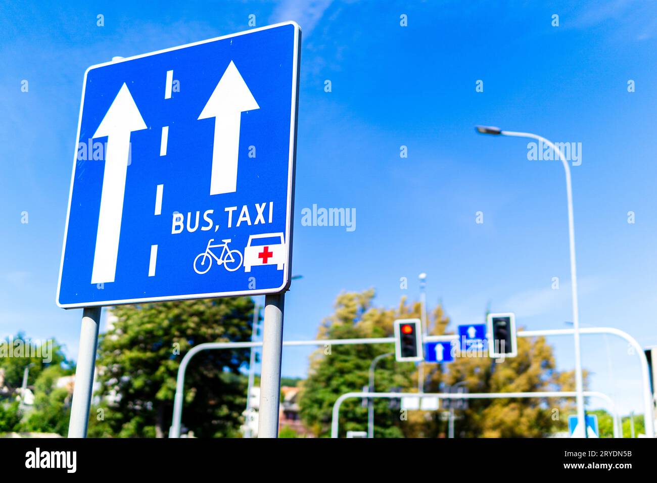 Taxi, cycling and ambulance special lane signage Stock Photo - Alamy