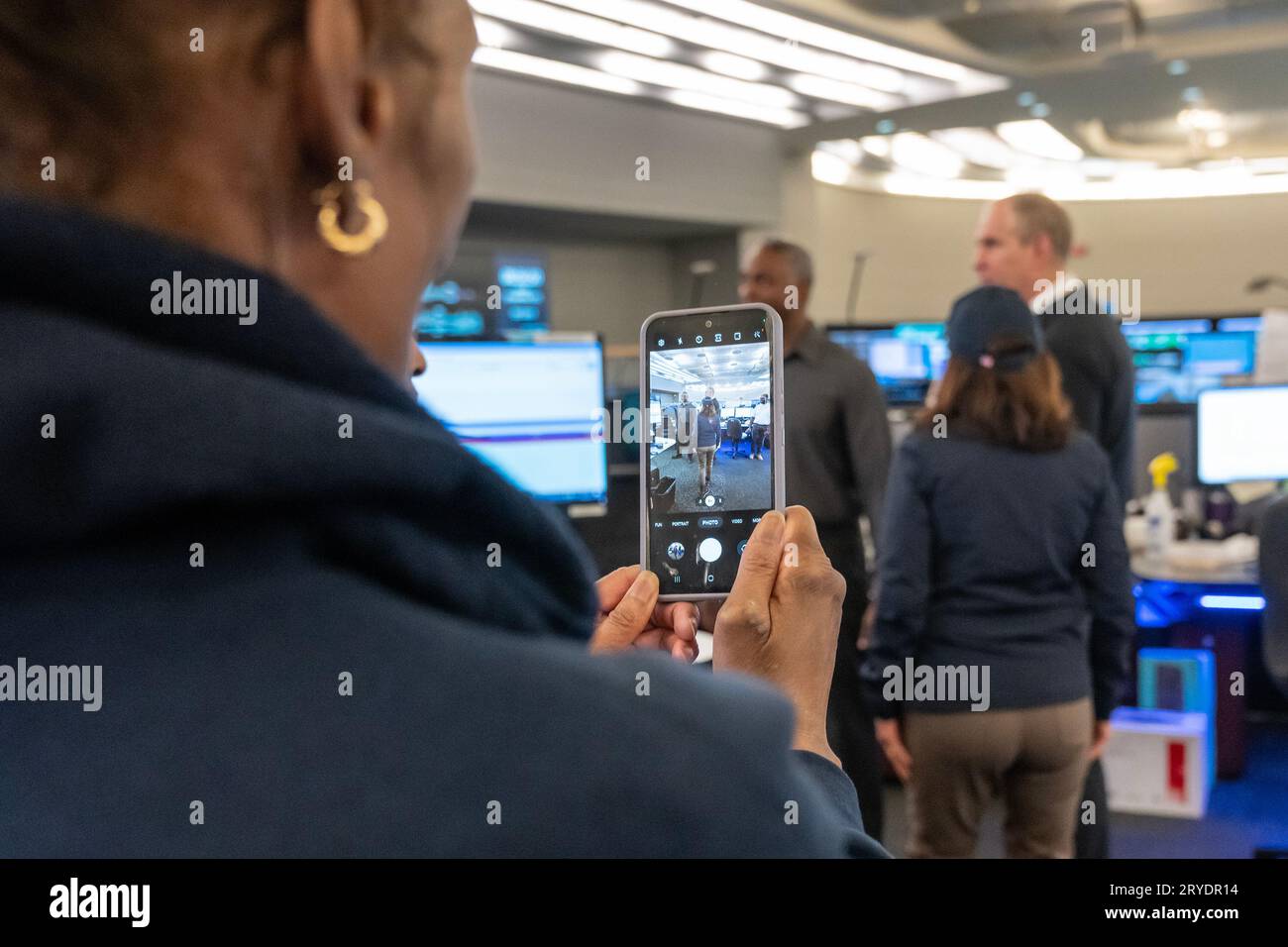 New York, USA. 30th Sep, 2023. MTA employee take a photo as Governor ...