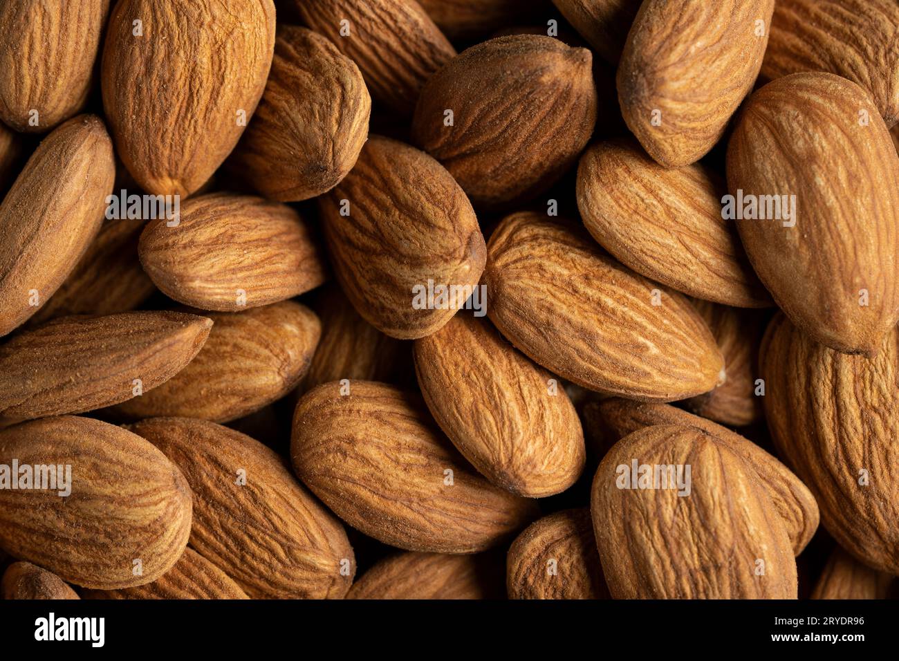 A closeup of indian organic almonds with sharp texture Stock Photo - Alamy