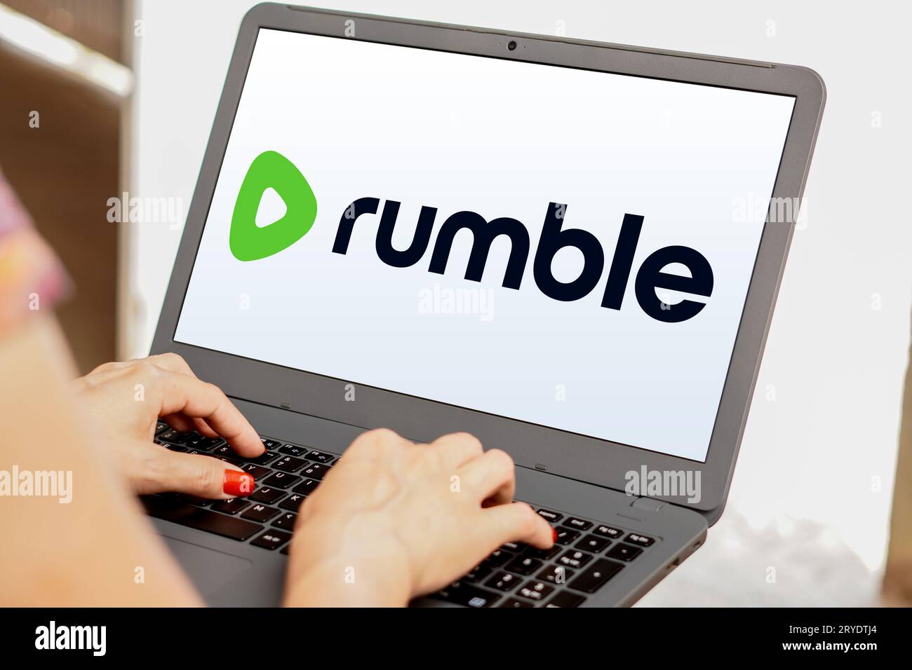In this photo illustration, the Rumble logo is displayed on a laptop ...