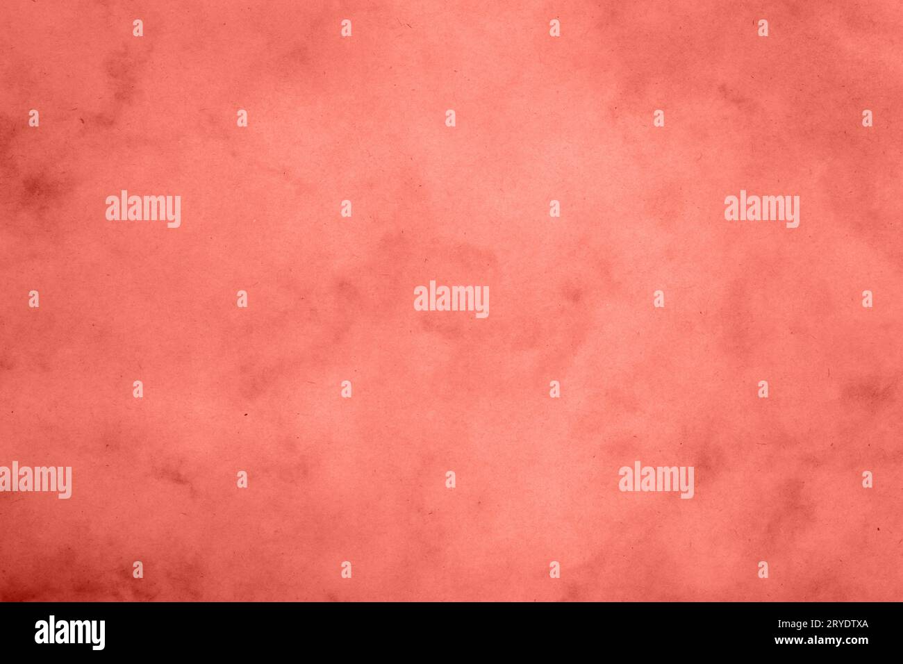 Coral pink toned paper parchment background Stock Photo - Alamy