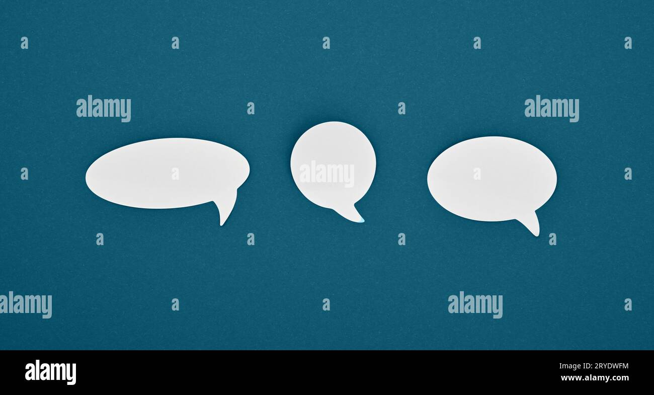 Three blank empty white paper callouts over blue Stock Photo - Alamy