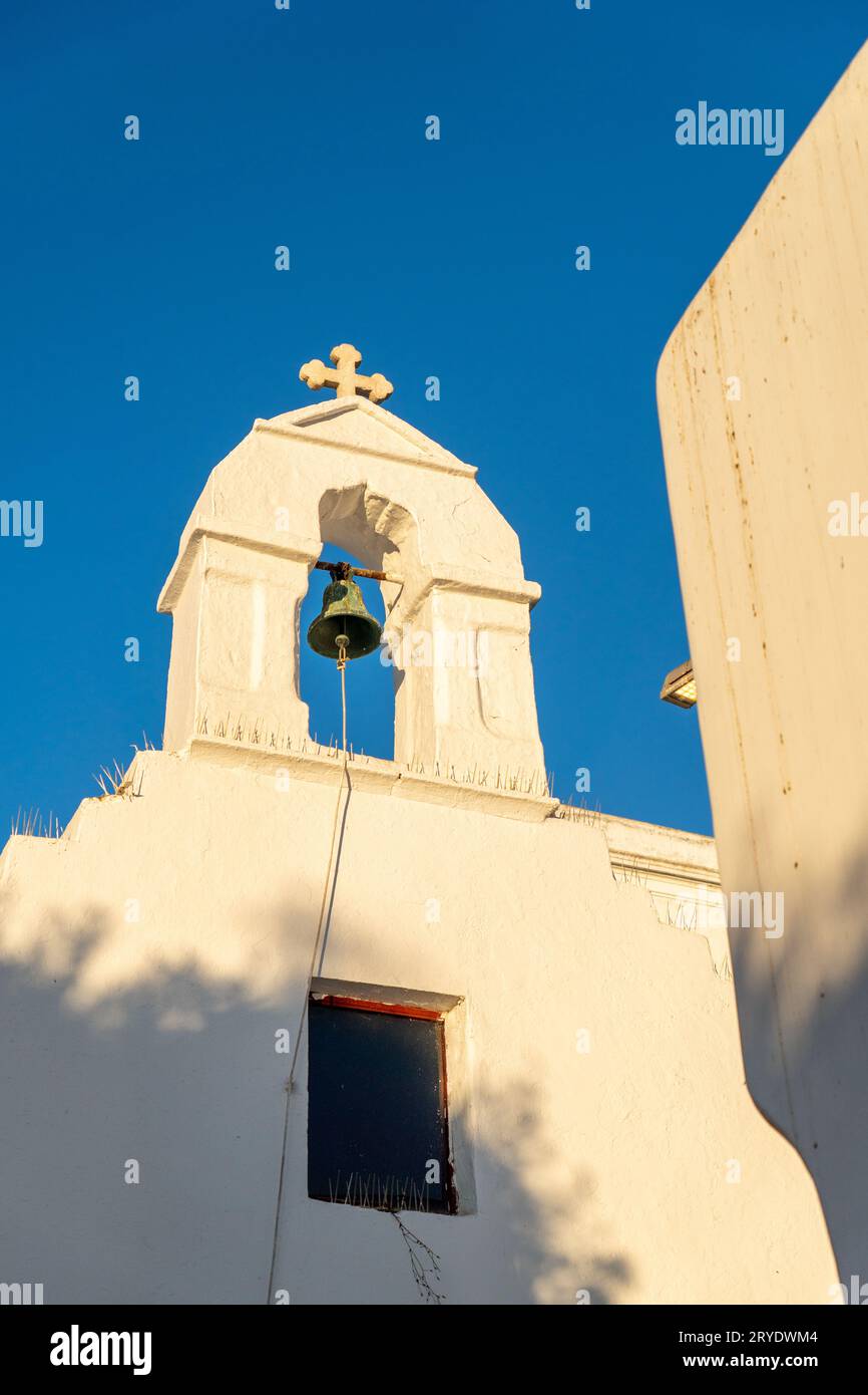 Greek church with anti-pigeon device and rusty bronze bell Stock Photo ...