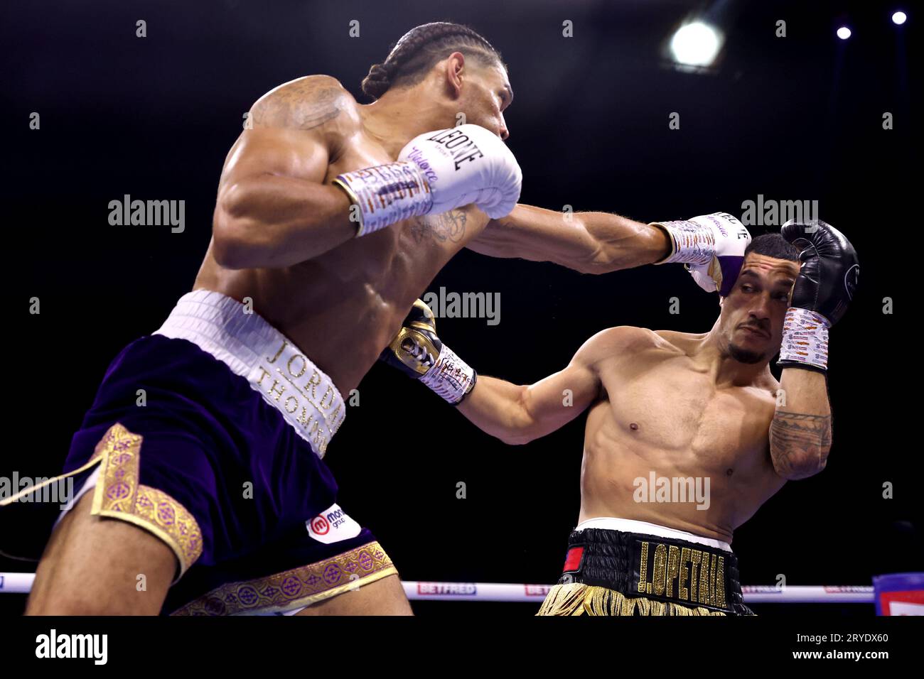 Jordan Thompson (left) and Jai Opetaia in action during the IBF World ...