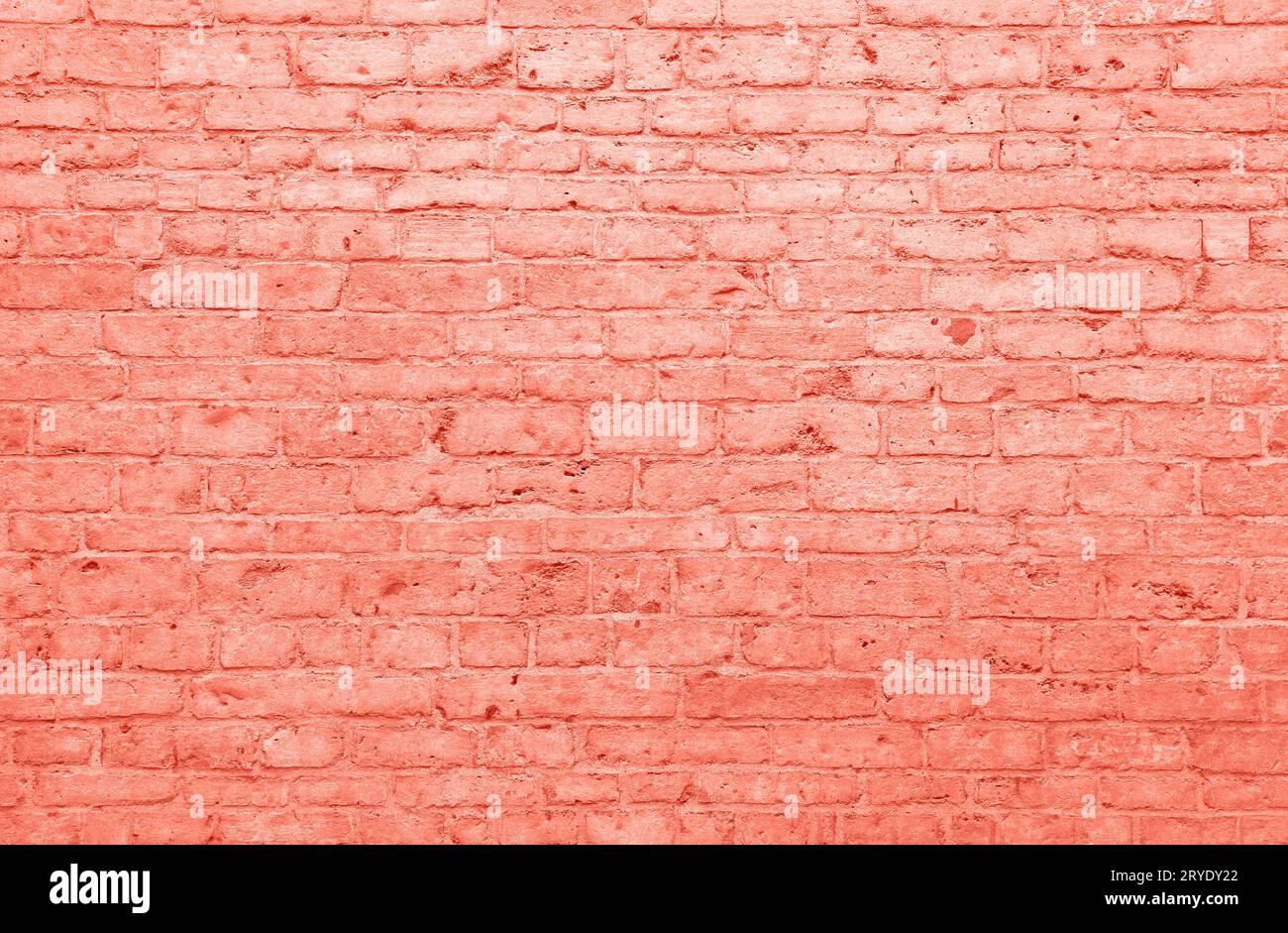 Coral pink toned brick wall background texture Stock Photo - Alamy